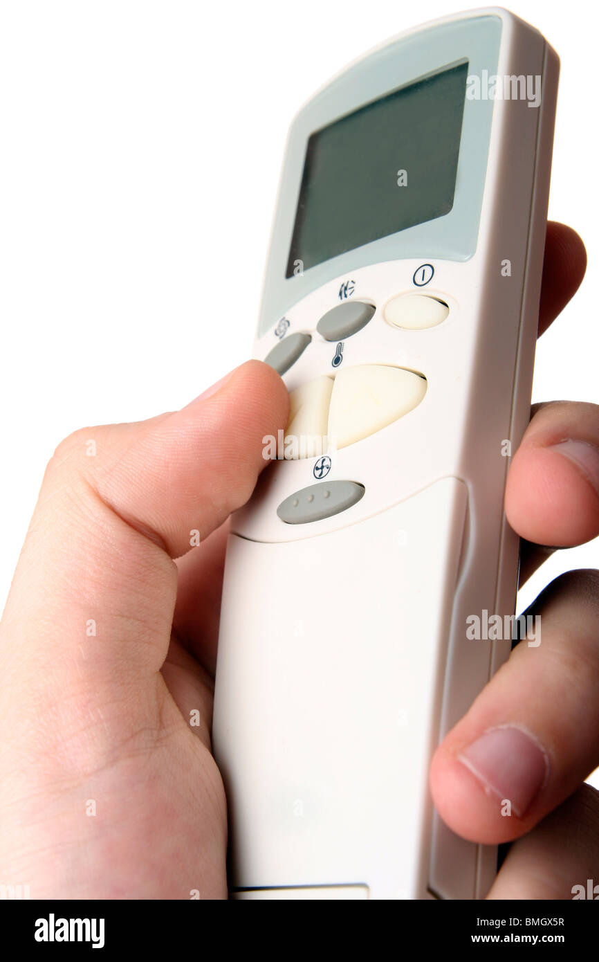 Télécommande en main d'un homme. Isolé sur fond blanc Photo Stock - Alamy