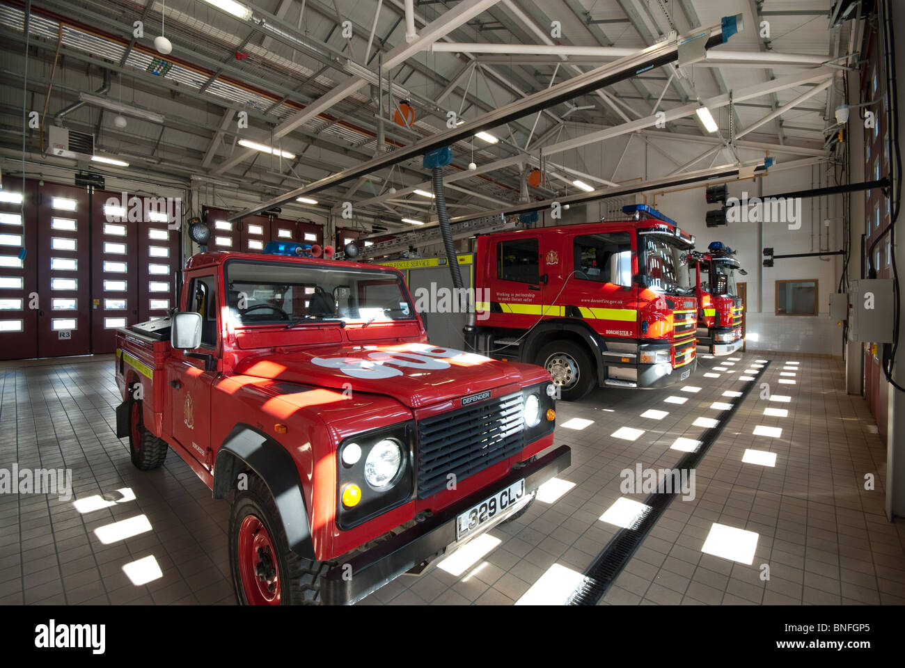 Fire engine inside fire station Banque de photographies et d’images à ...