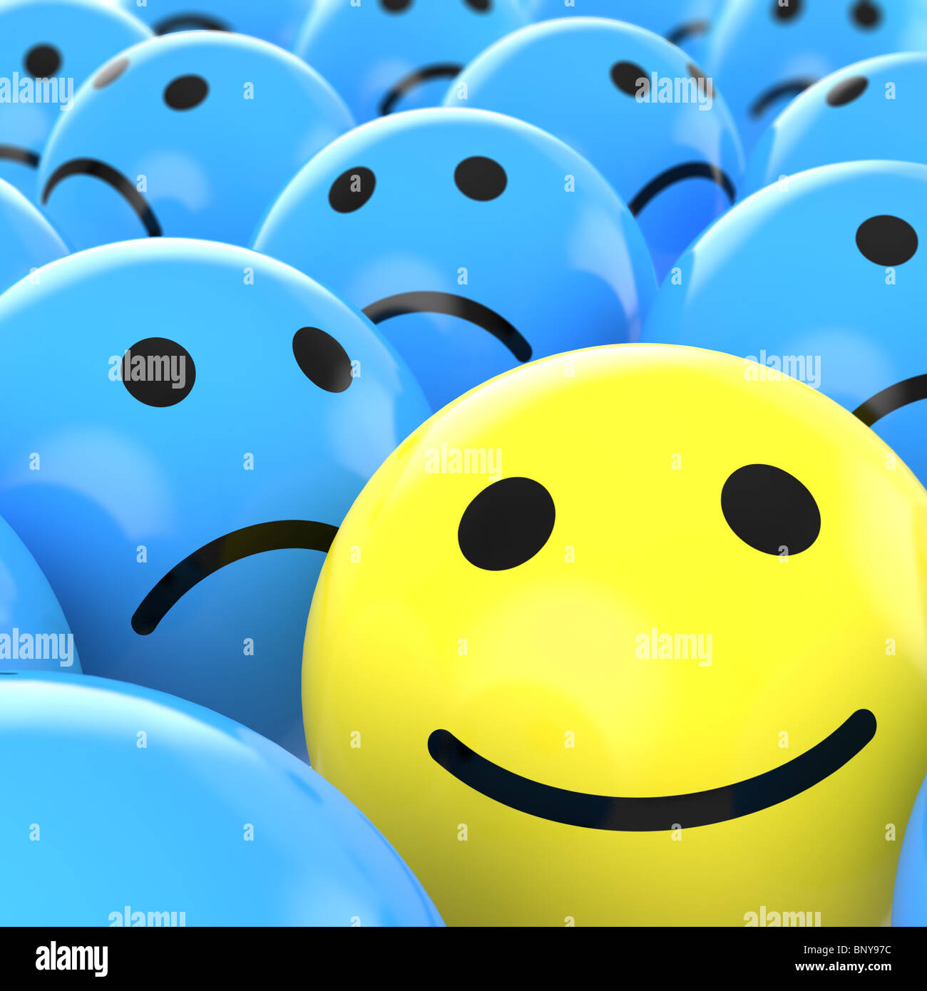 Close up of a yellow heureux smiley bleu entre de nombreux autres ...