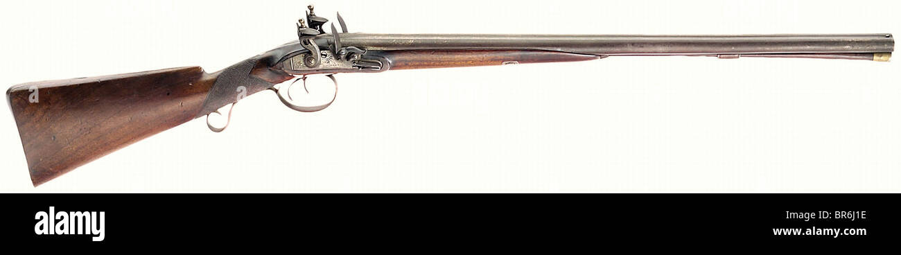 A double barrelled flintlock shotgun Banque de photographies et d ...
