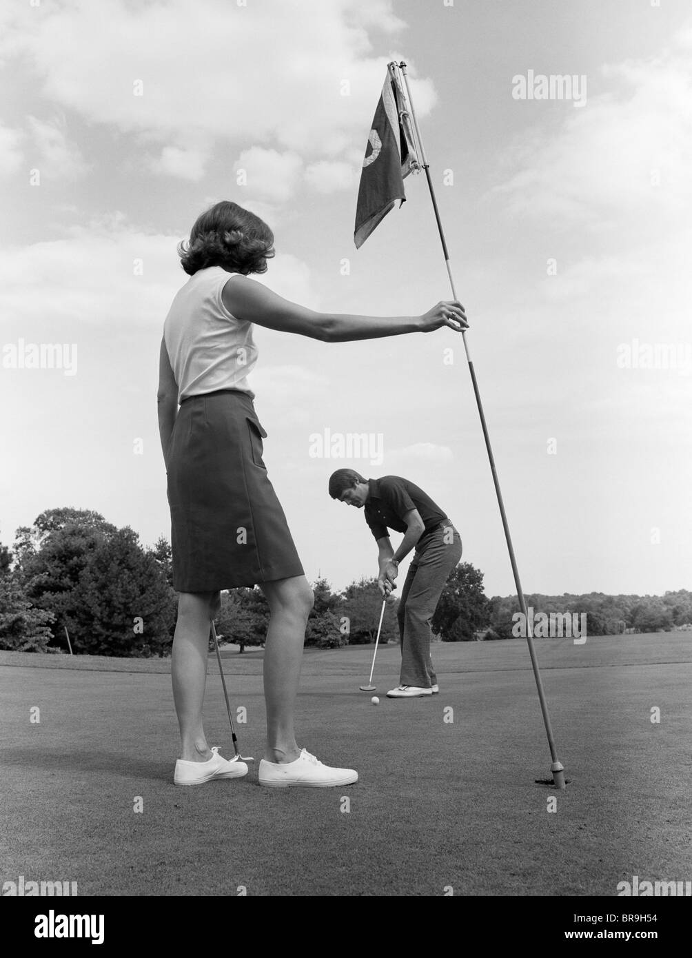 Black and white man playing golf Banque de photographies et d’images à ...