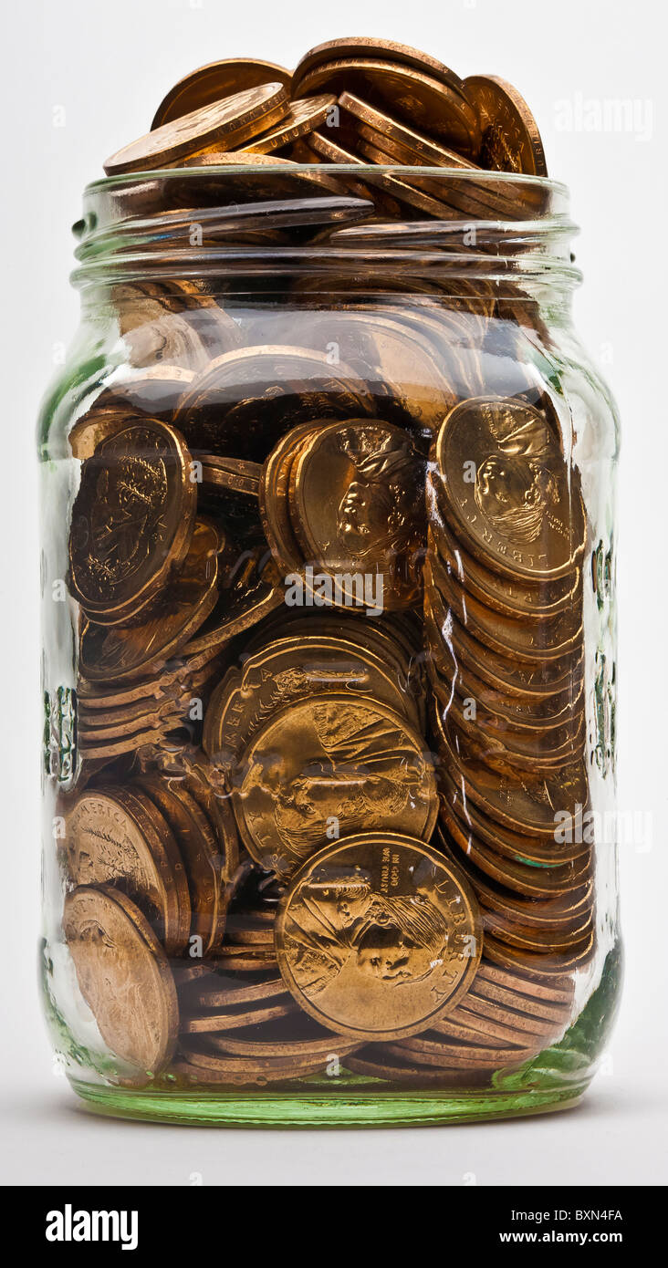 Jar full dollar gold coins Banque de photographies et d’images à haute ...