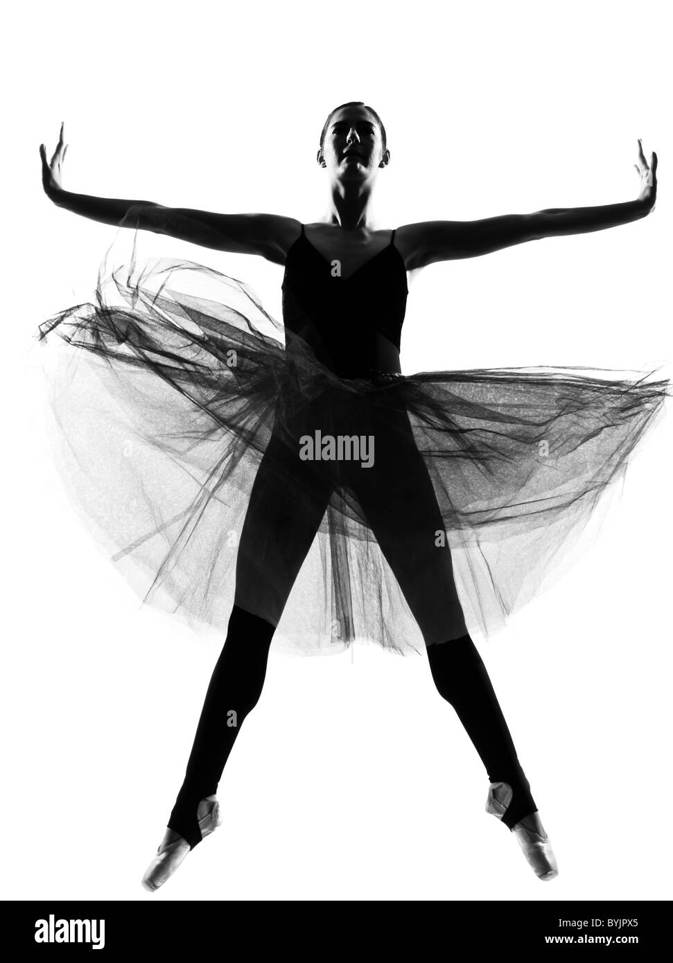 Un beau ballet dancer dancing woman jumping Saut longueur complète sur ...