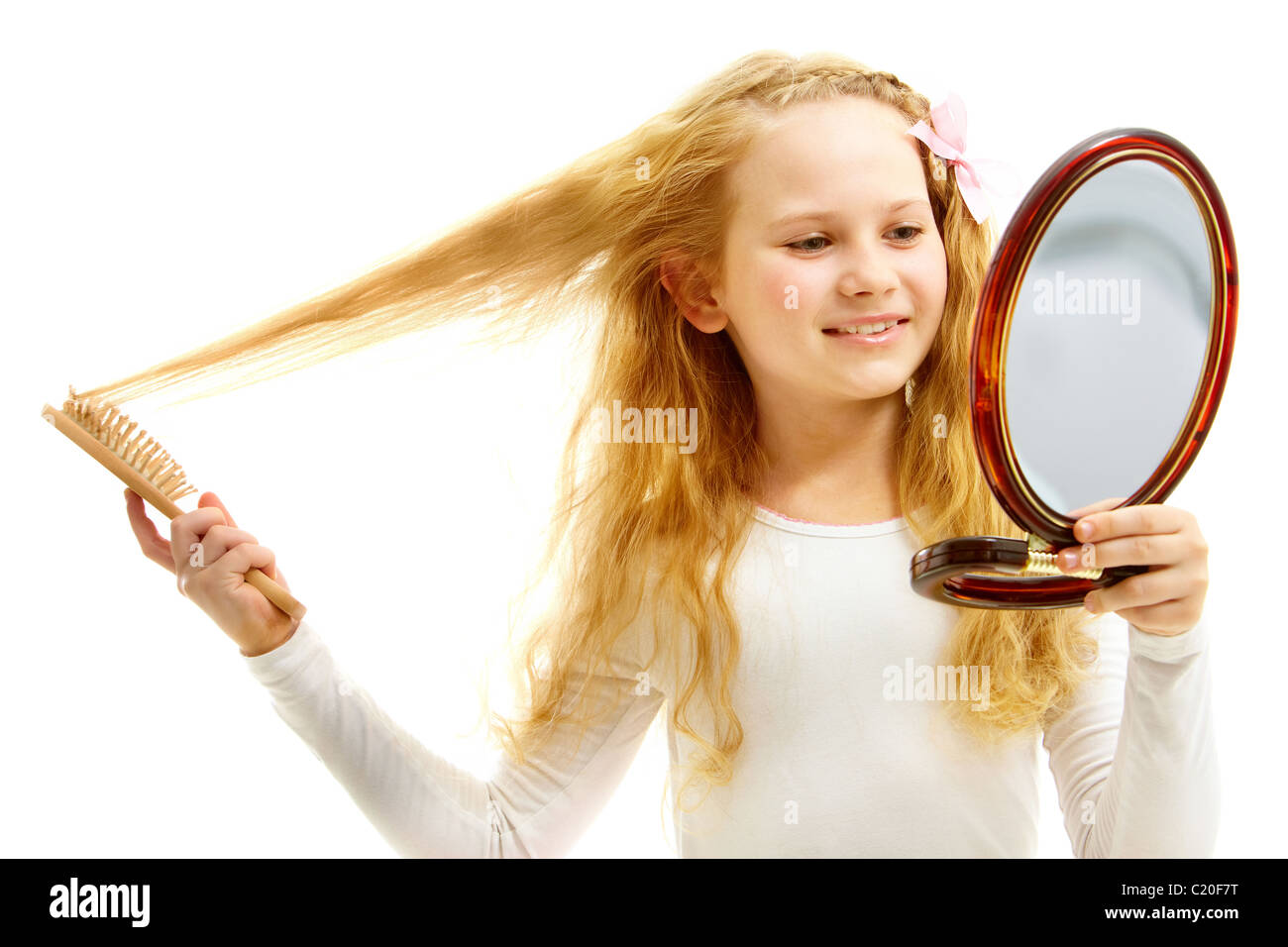 Fille devant un miroir Banque d'images détourées - Alamy
