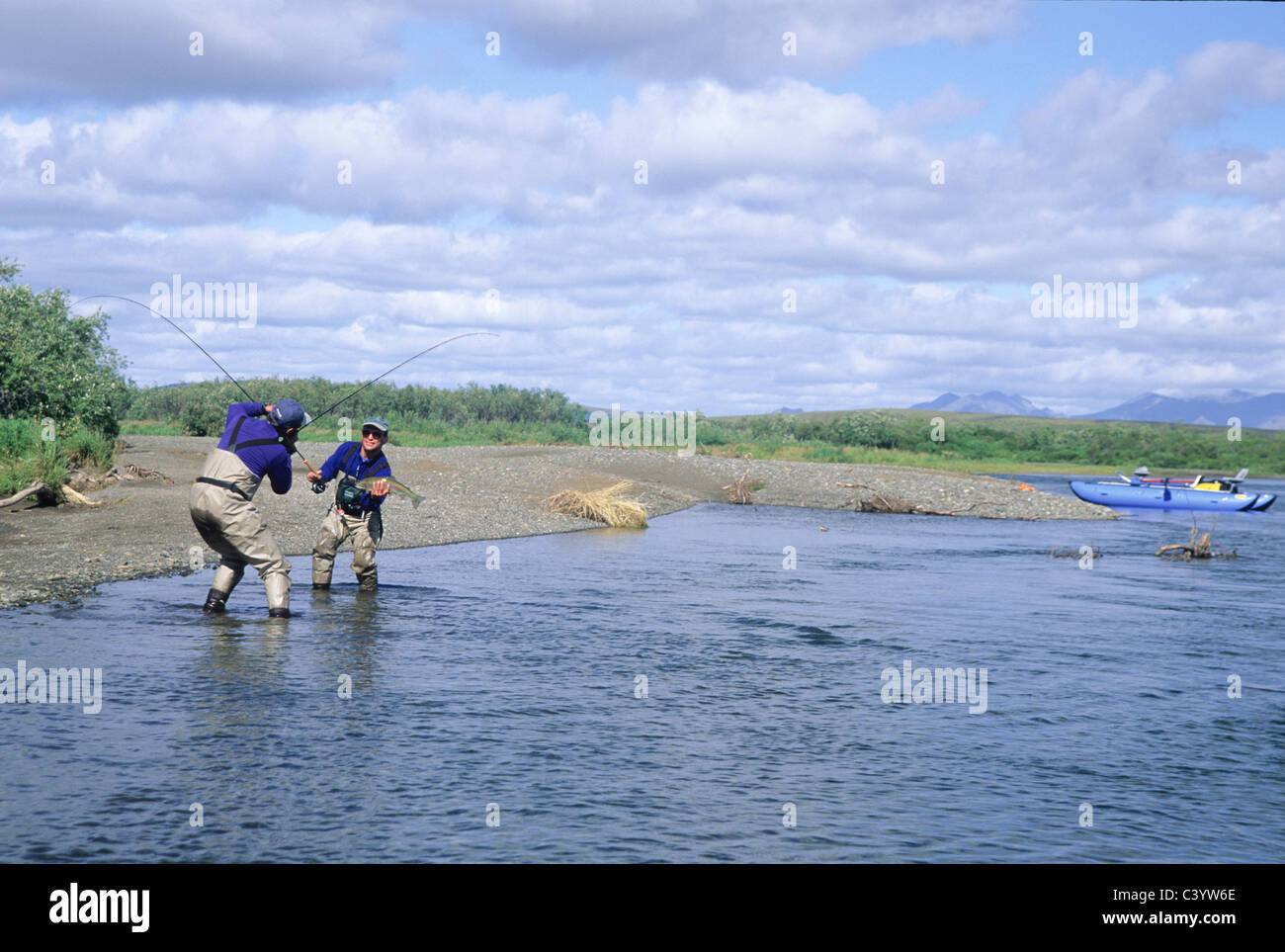 Men with fishing rods Banque de photographies et d’images à haute ...