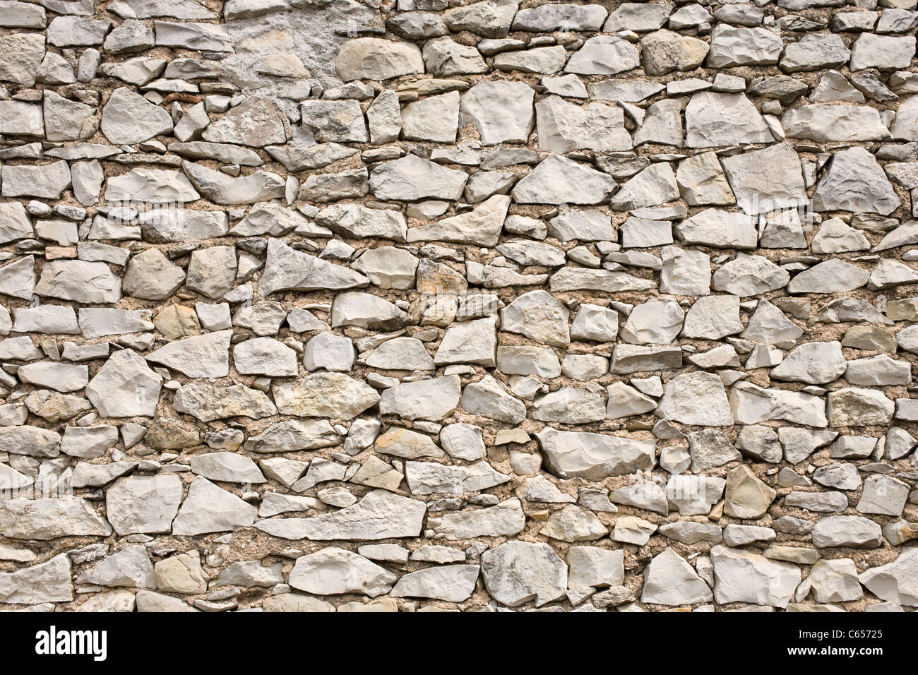 Un mur de pierre blanche dans un village de Provence Photo Stock - Alamy