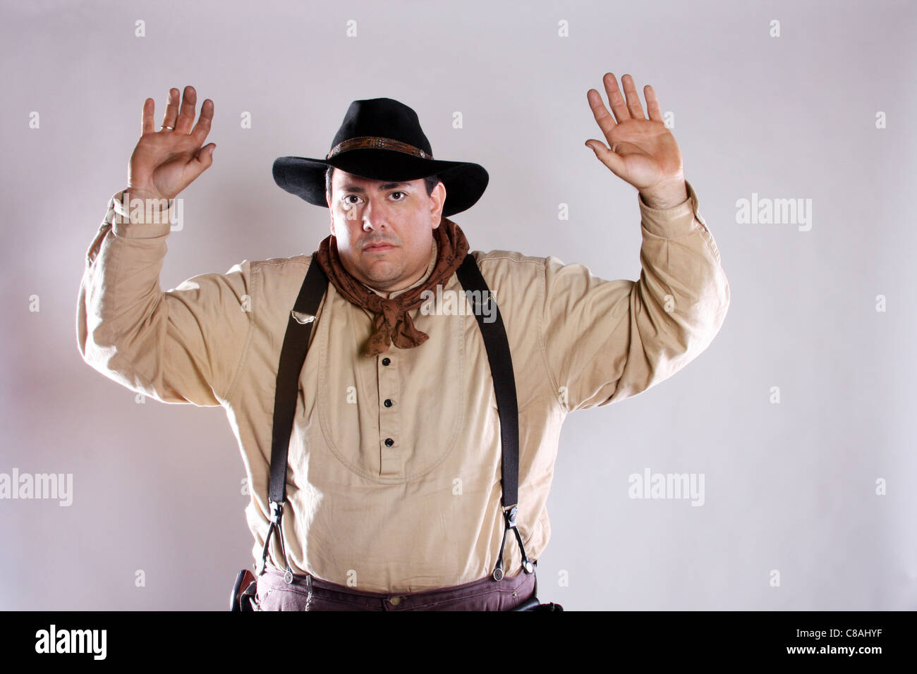 Old west cowboy hands up Banque de photographies et d’images à haute ...
