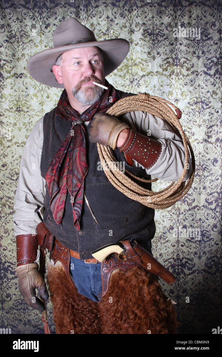 Smoking gun cowboy Banque de photographies et d’images à haute ...