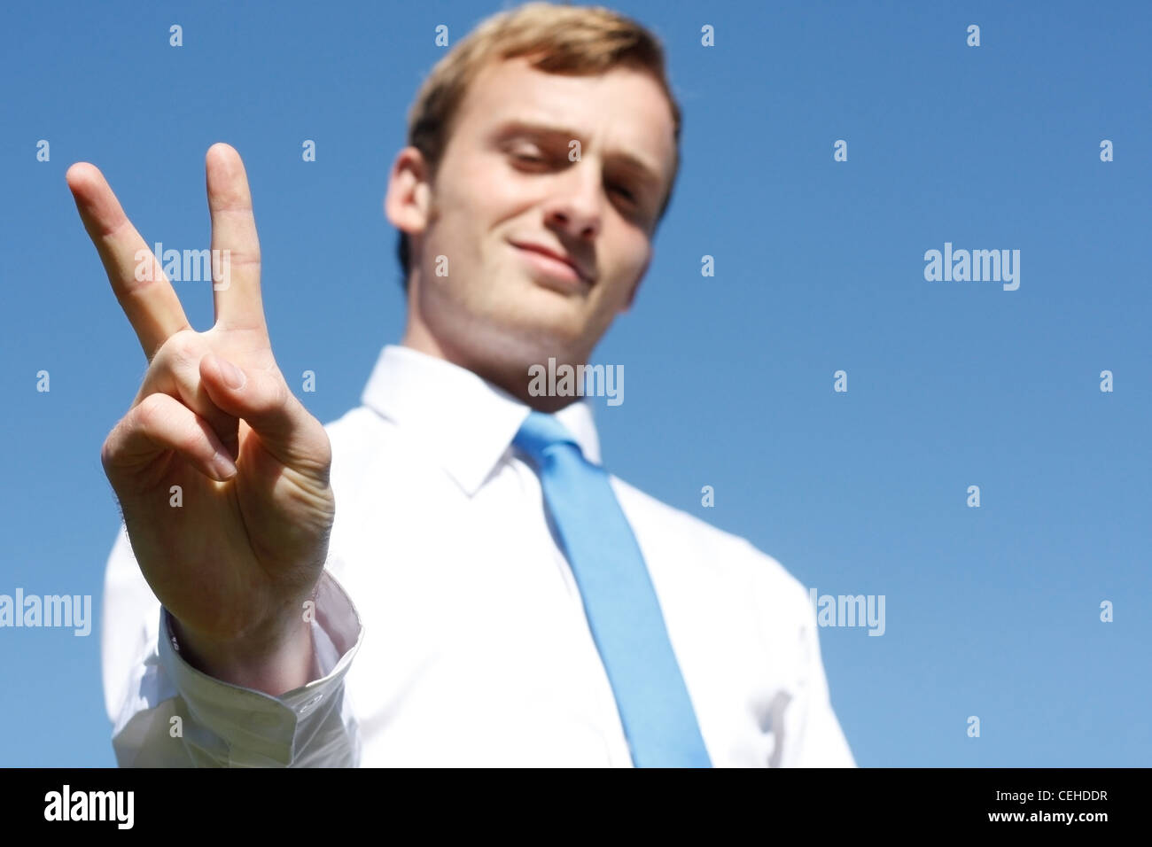 Homme De Signe V Banque d'image et photos - Alamy