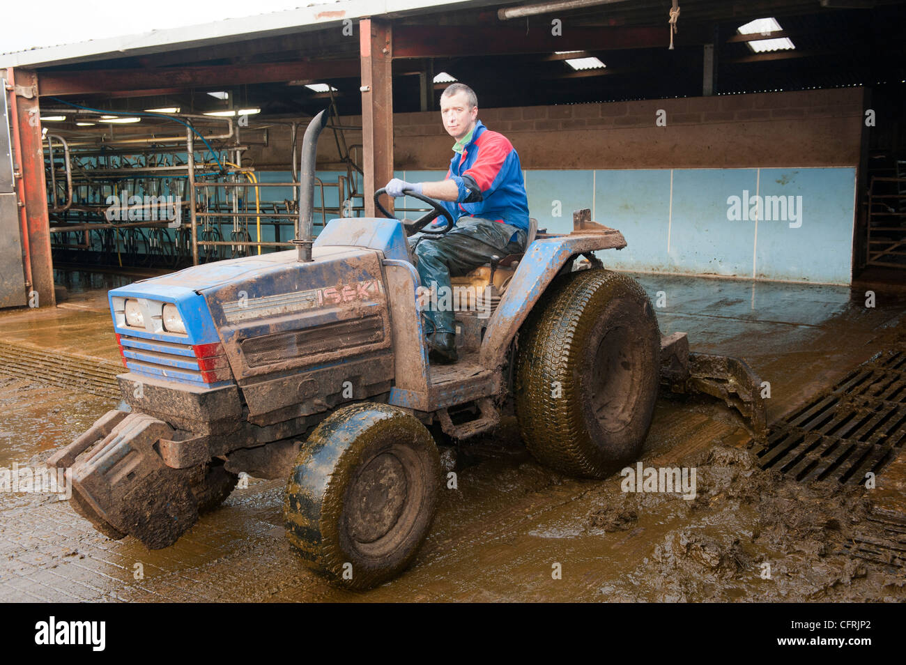 Fermier sur son tracteur Banque de photographies et d’images à haute ...