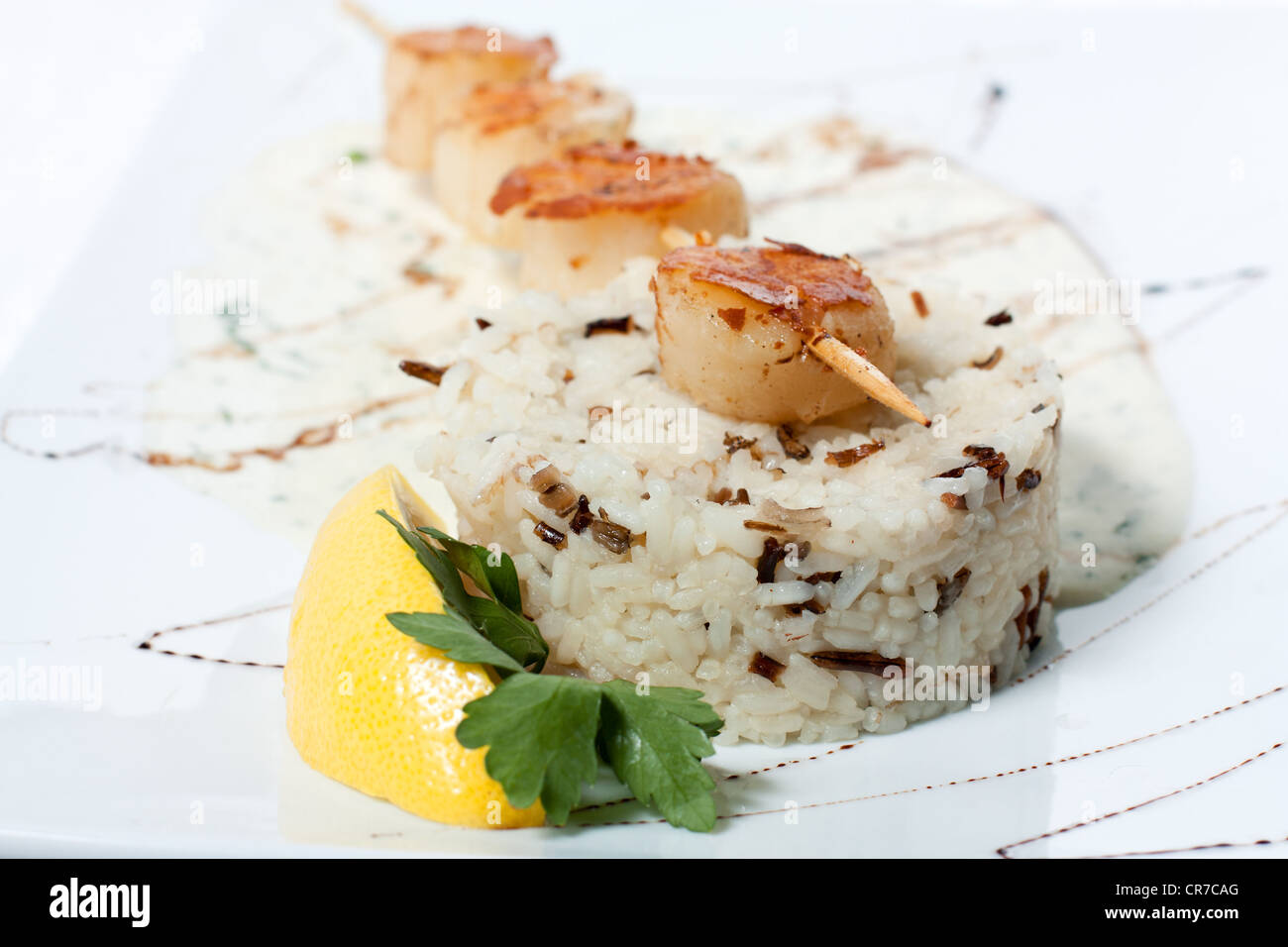 Riz au poisson Banque de photographies et d’images à haute résolution ...