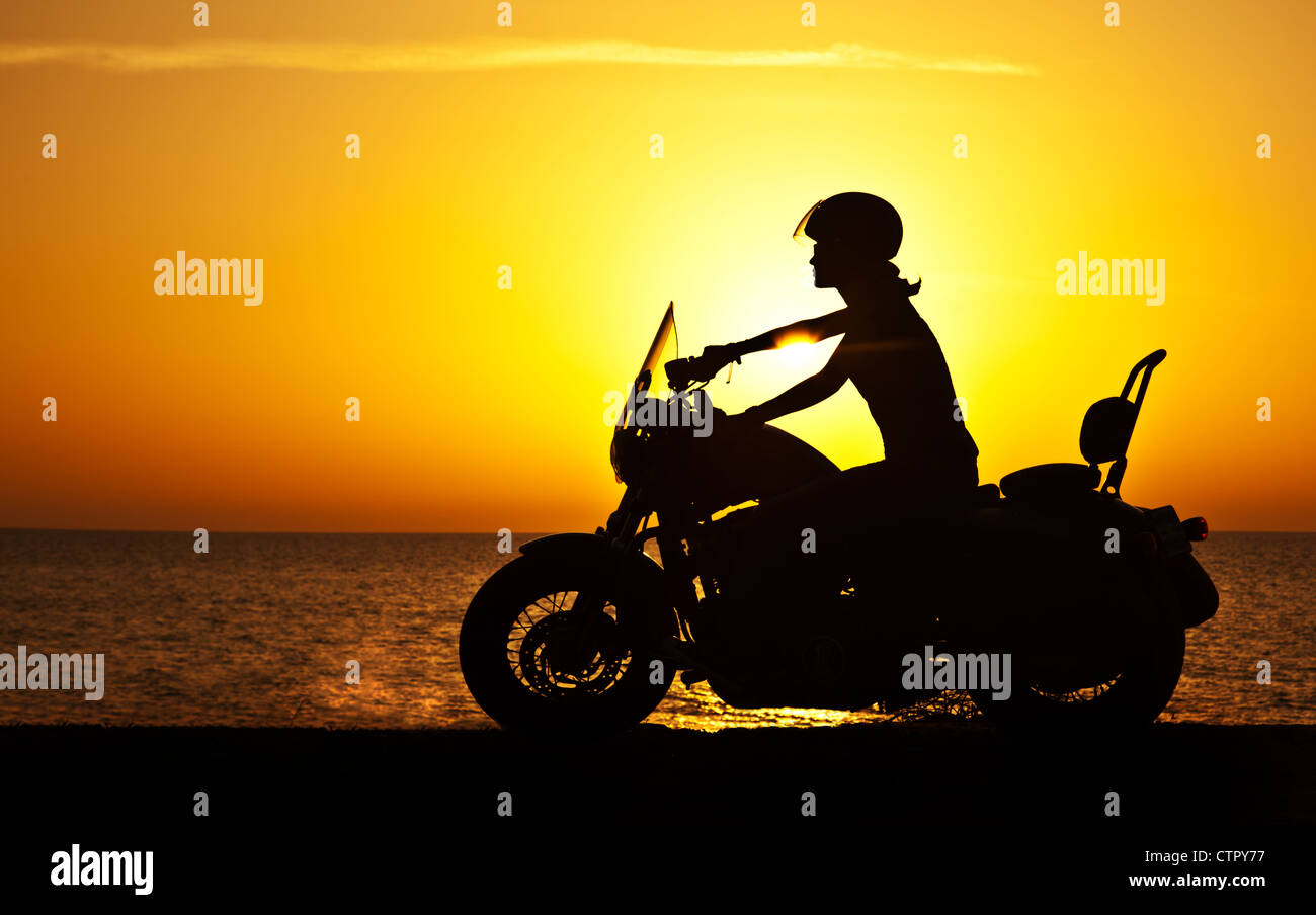 Femme en moto de course Banque de photographies et d’images à haute ...