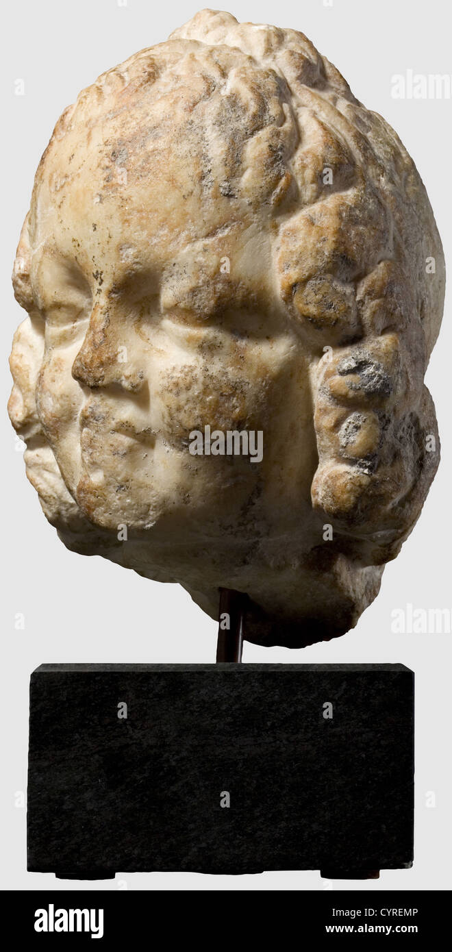 Une tête de cupide en marbre romain, 1st/2nd Century A.D. tête de ...