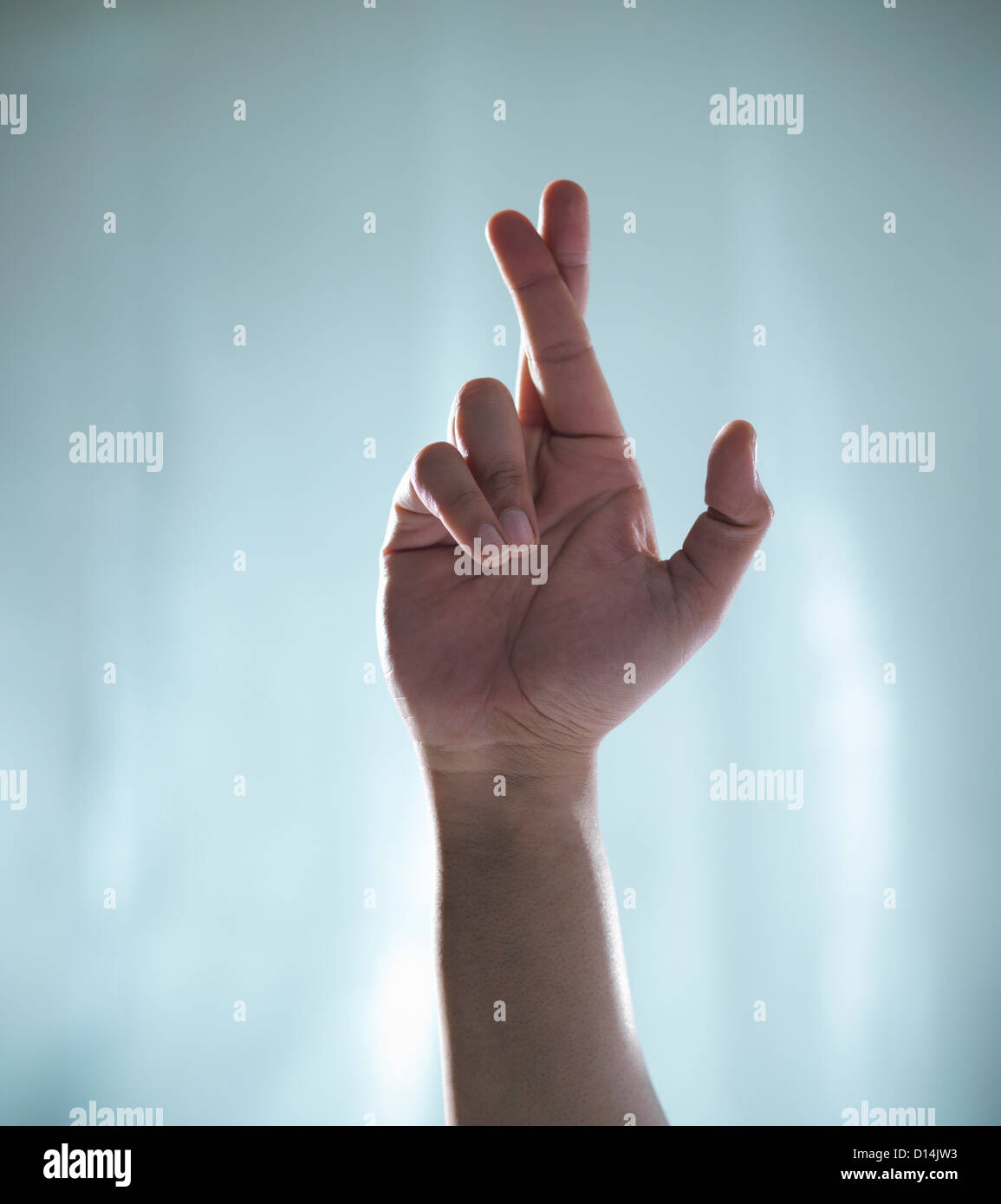 Fingers Crossed Banque d'image et photos - Alamy