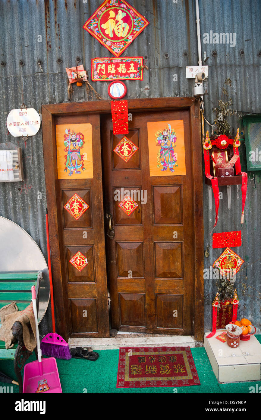 La Chine, Macao, l'île de Coloane, doorside culte à un Coloane Village ...