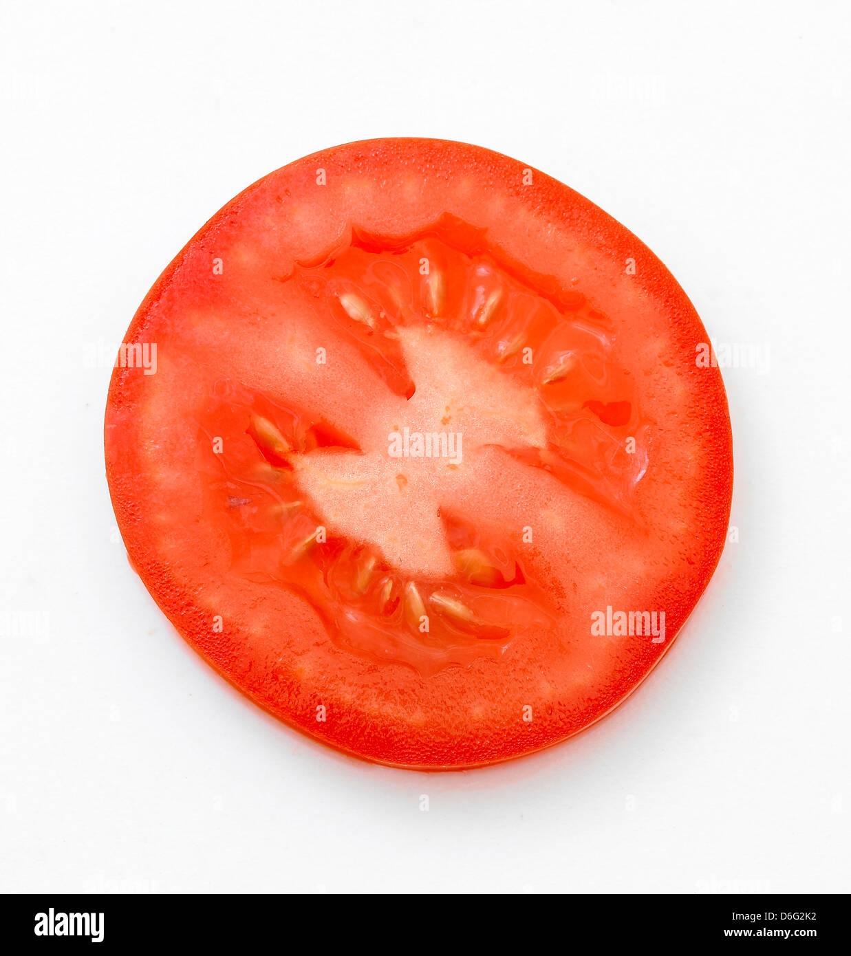 Tomate montrant des graines Banque d'images détourées - Alamy