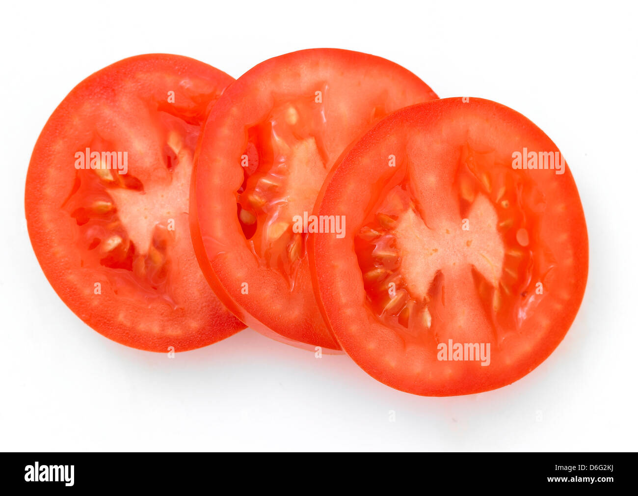 Tomate montrant des graines Banque de photographies et d’images à haute ...