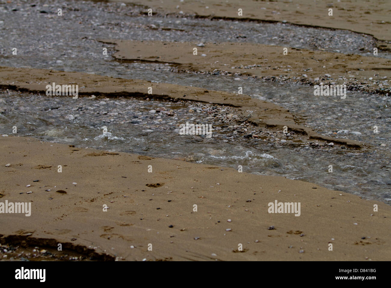 Sable et mer Banque de photographies et d’images à haute résolution - Alamy