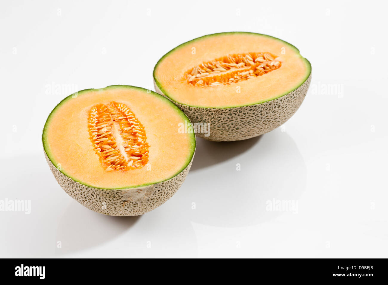 Melons cantaloup sur fond blanc Banque de photographies et d’images à ...