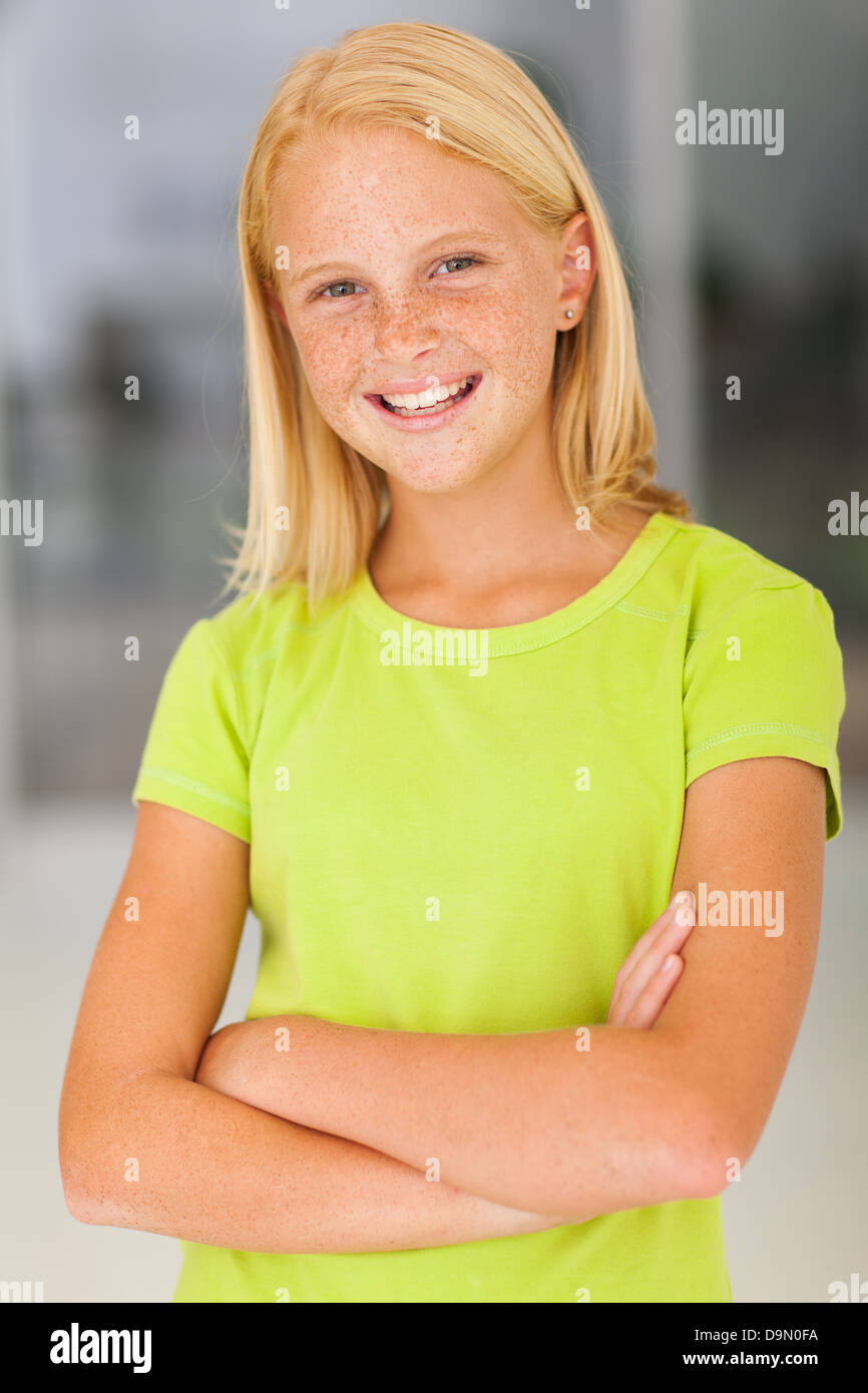 Confiant preteen girl woman with arms crossed Photo Stock - Alamy