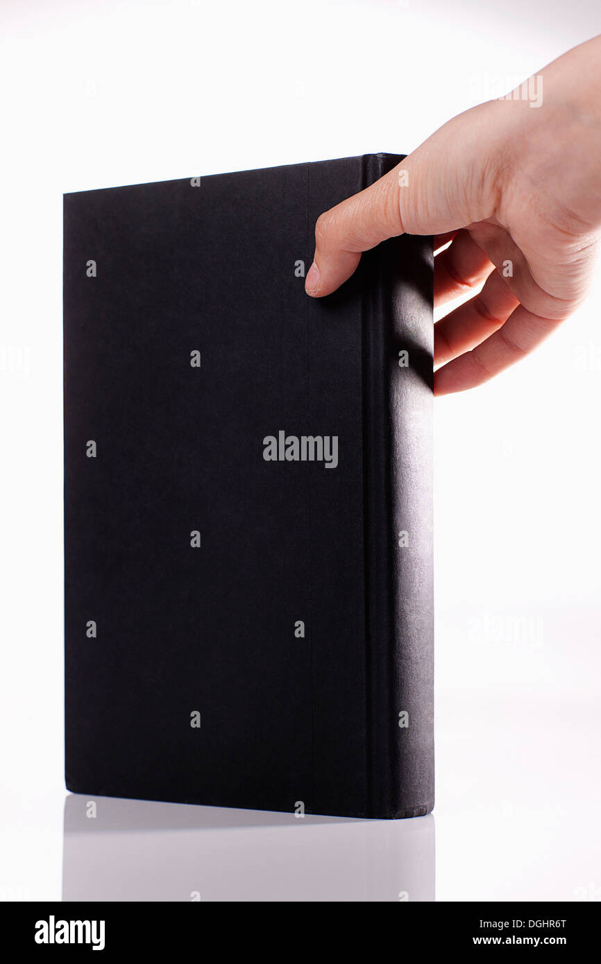 Main de livre Banque de photographies et d’images à haute résolution ...