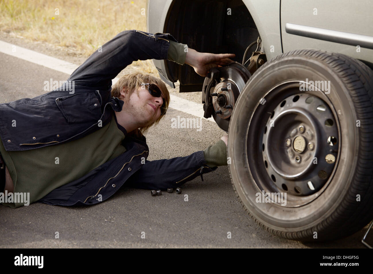 Change tyre Banque de photographies et d’images à haute résolution - Alamy