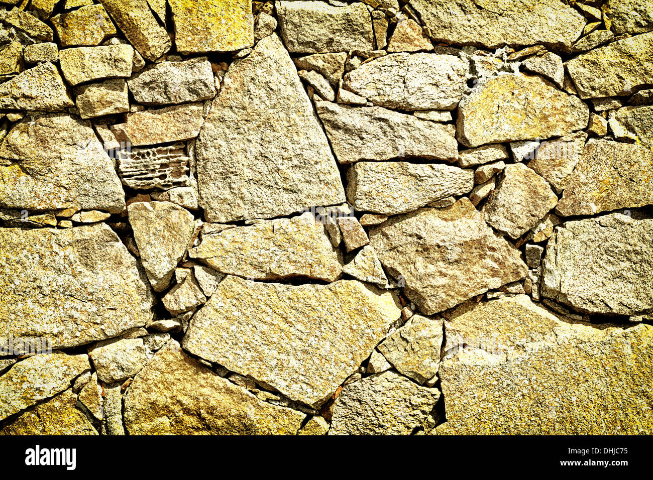 Arrière-plan de la texture du mur de roche en pierre naturelle ou pavés ...