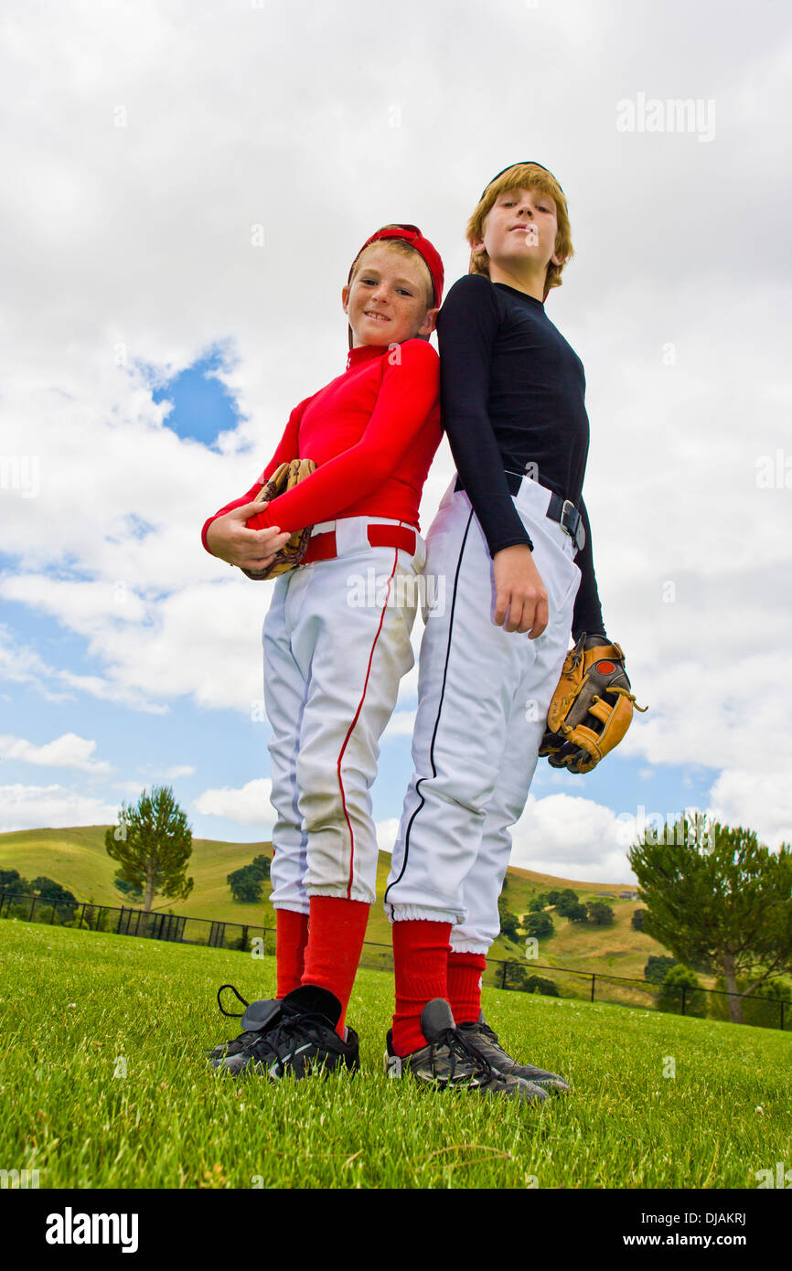 Baseball Players standing in field Photo Stock - Alamy