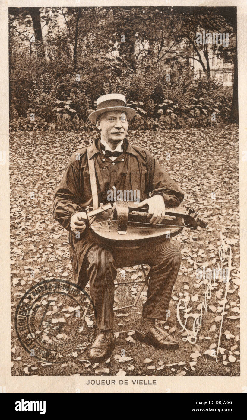 Vieil homme avec vielle Banque de photographies et d’images à haute ...