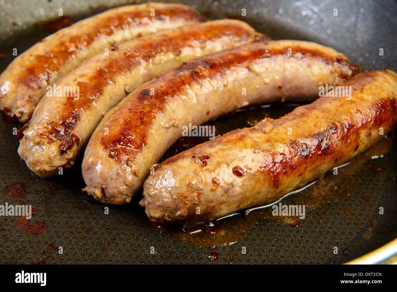 Saucisses de porc frites Banque de photographies et d’images à haute ...