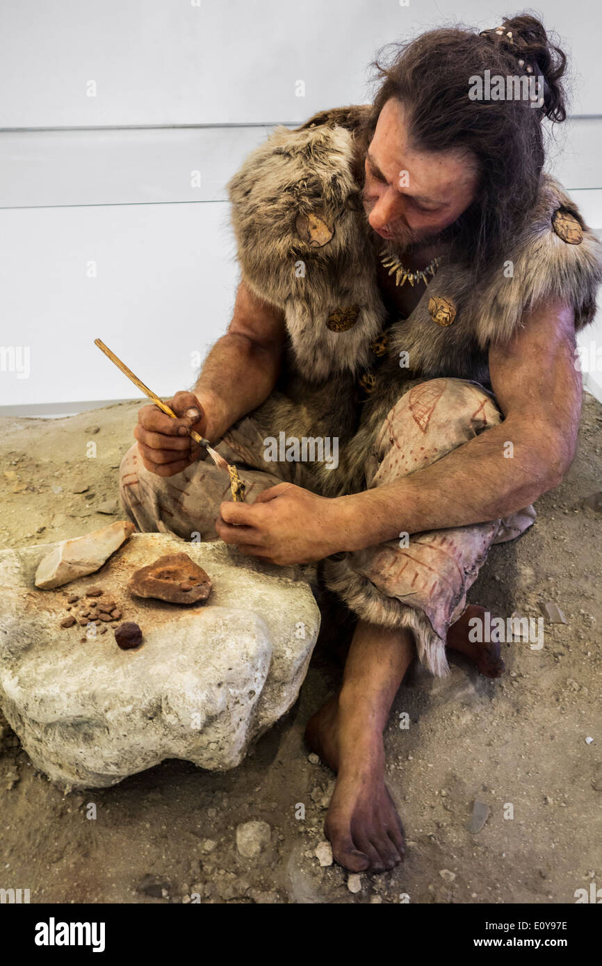 L'homme de Cro-Magnon qui travaillent avec des outils de pierre au Pôle ...