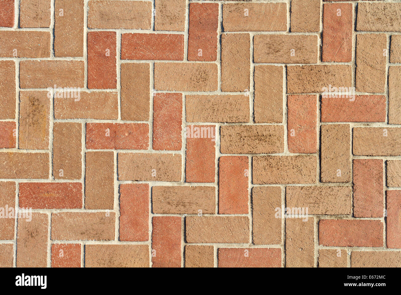 Une brique d'argile rouge et brun allée pavés ou de l'entrée texture de ...