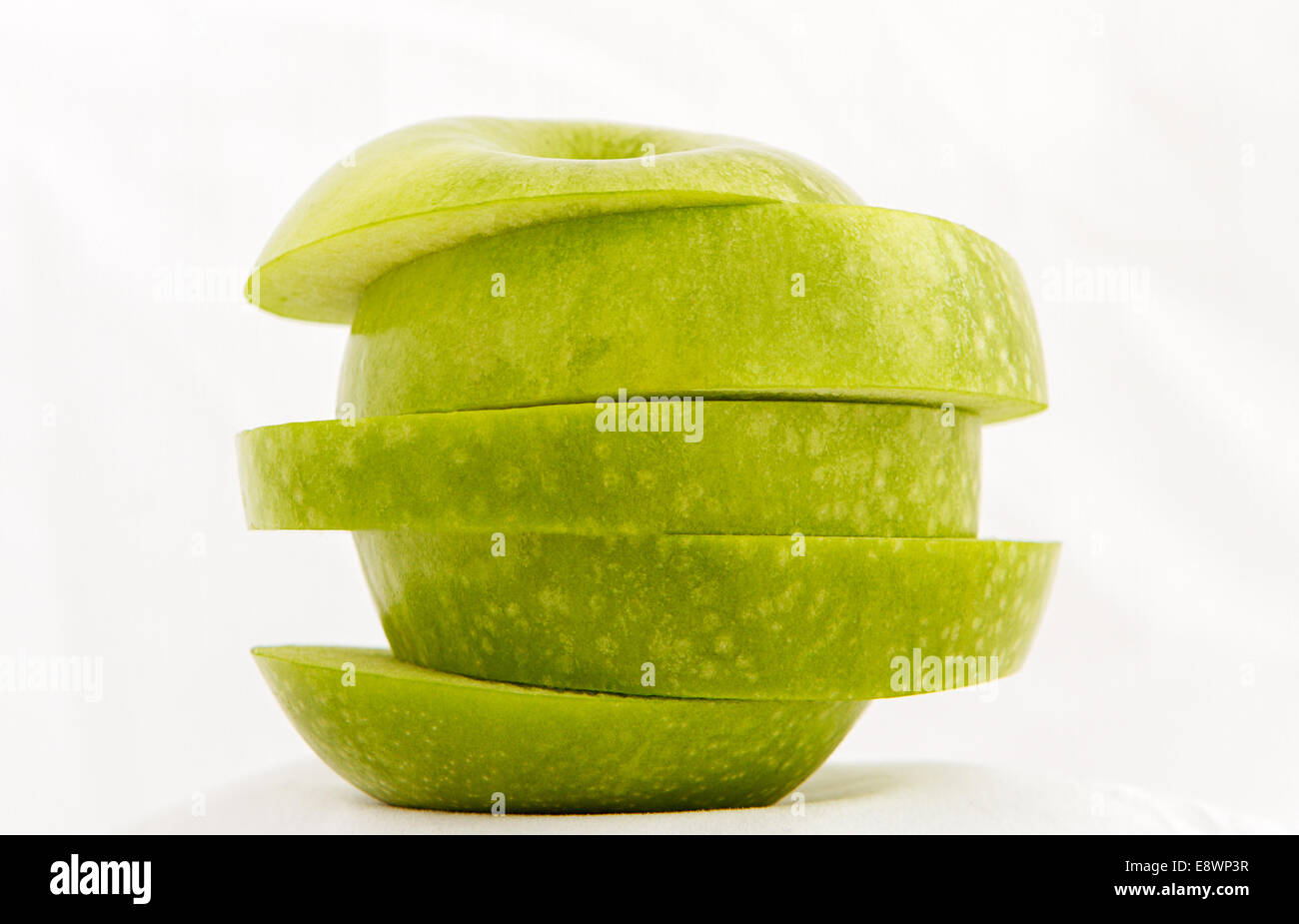 Tranches de pomme verte Banque de photographies et d’images à haute ...