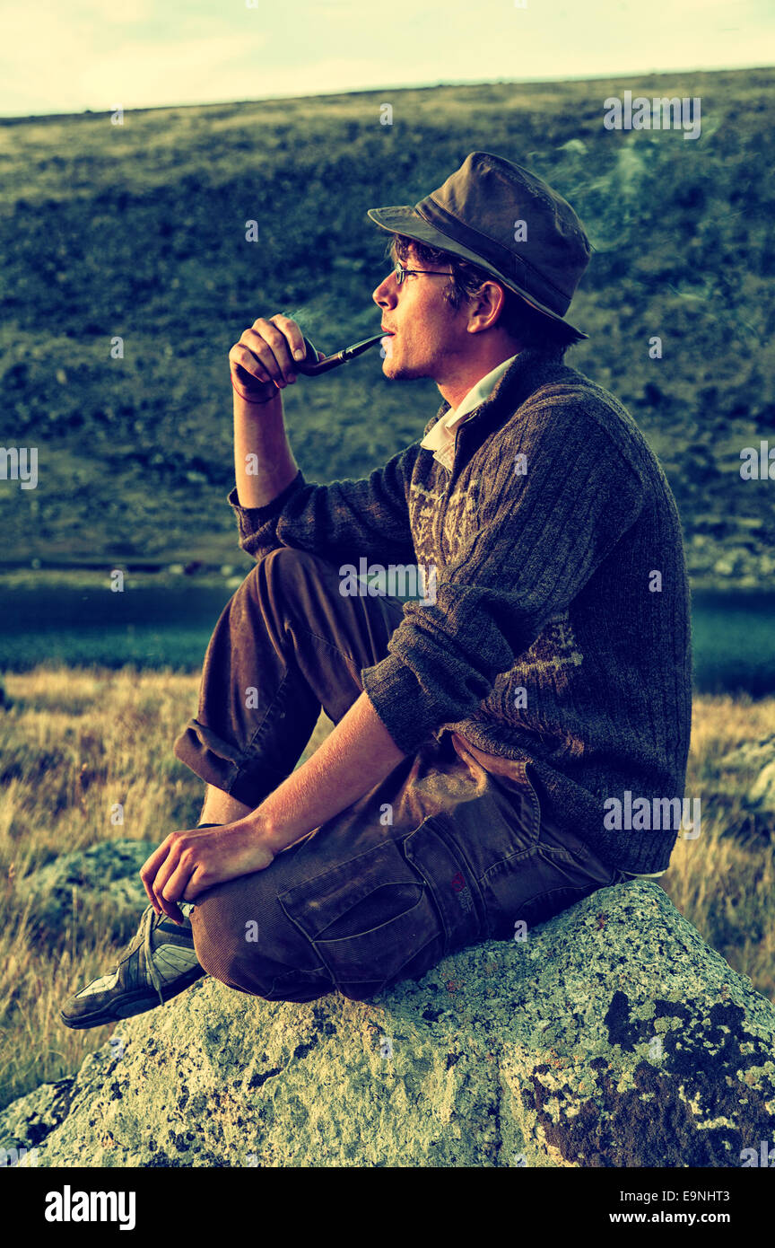 Homme fumeur Banque de photographies et d’images à haute résolution - Alamy