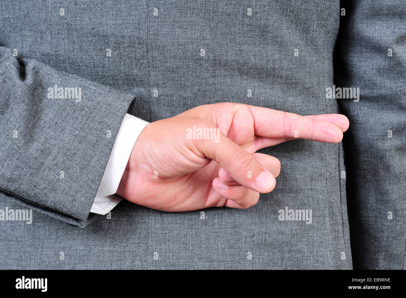 Homme croiser doigts Banque de photographies et d’images à haute ...