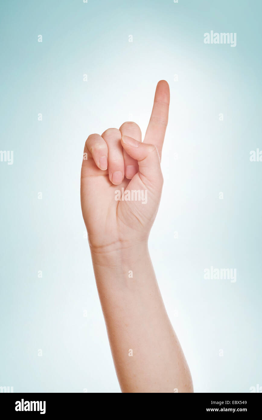 Hand raised index finger Banque de photographies et d’images à haute ...