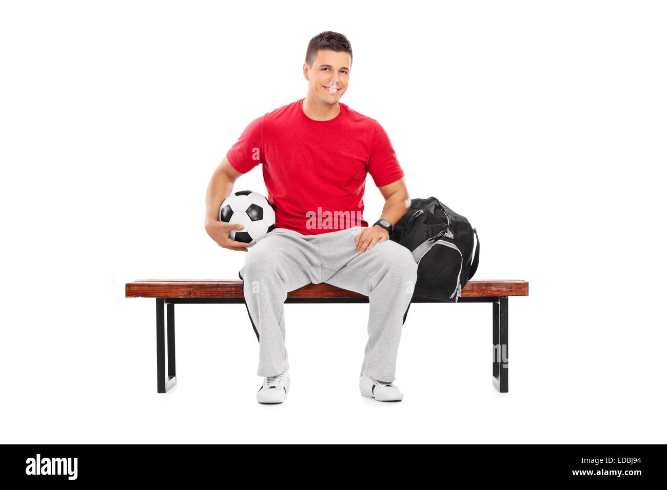 Jeune sportif assis sur un banc Banque de photographies et d’images à ...