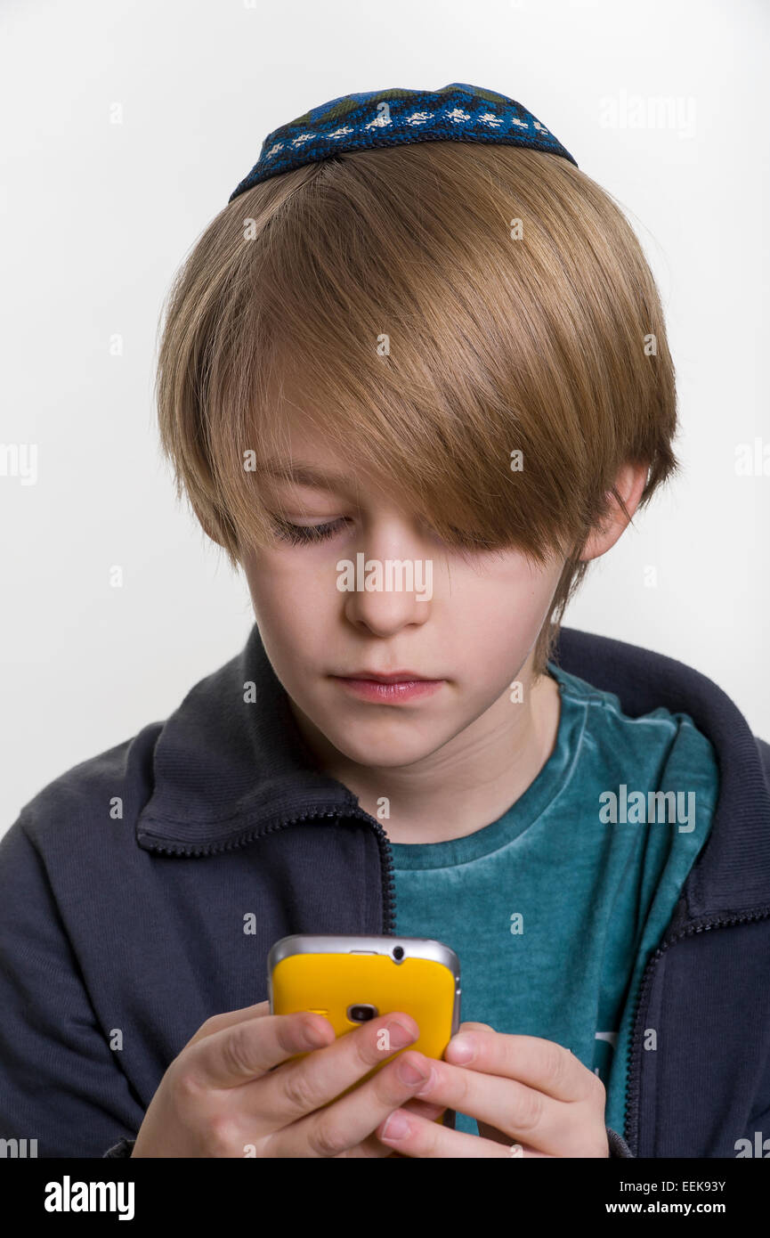 Unhappy blond jewish boy Banque de photographies et d’images à haute ...