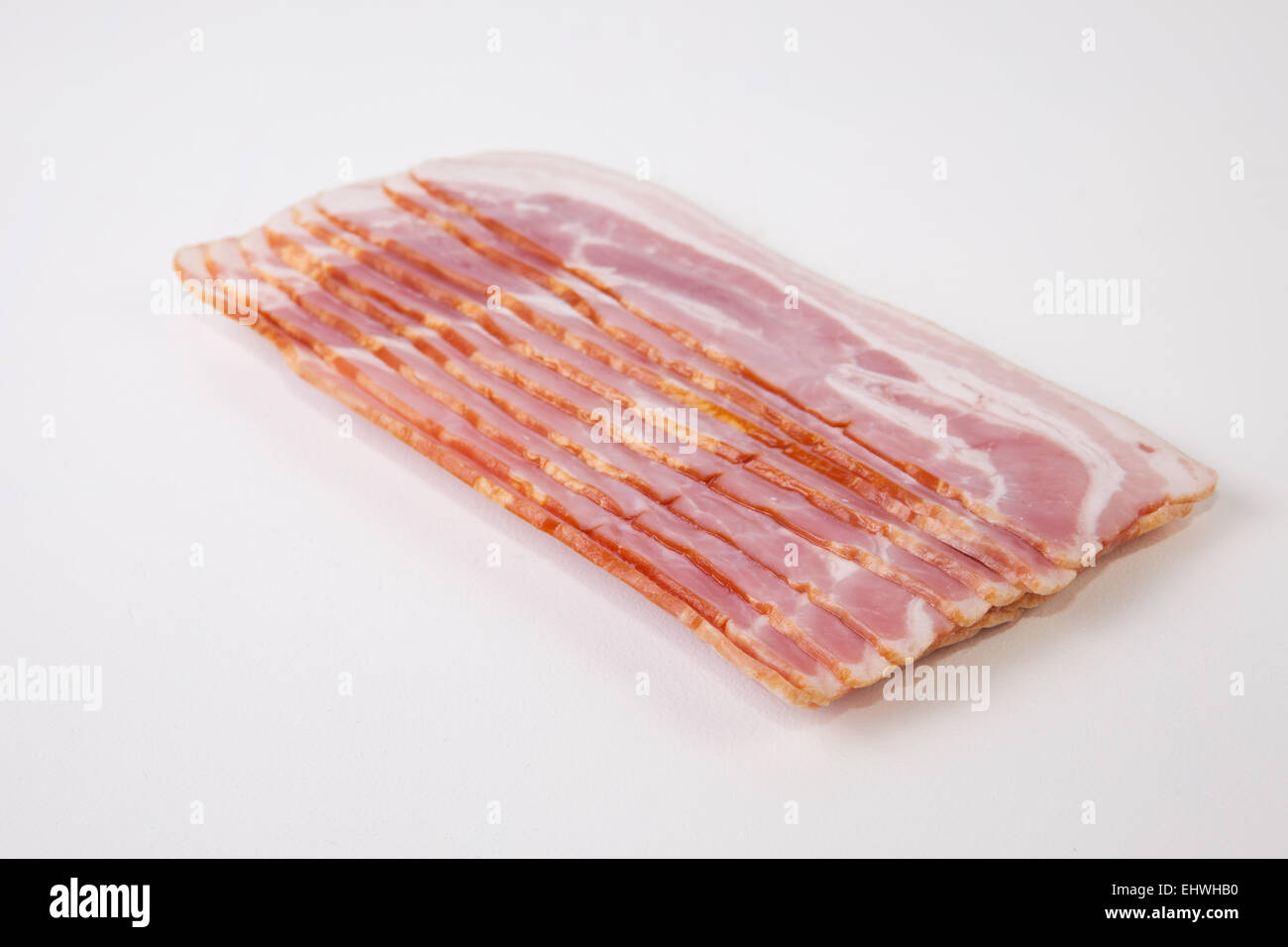 Tranches de bacon cru Banque de photographies et d’images à haute ...