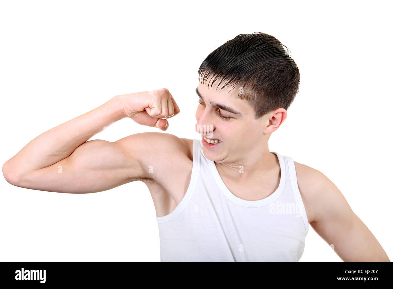 Flexion musculaire adolescent Photo Stock - Alamy