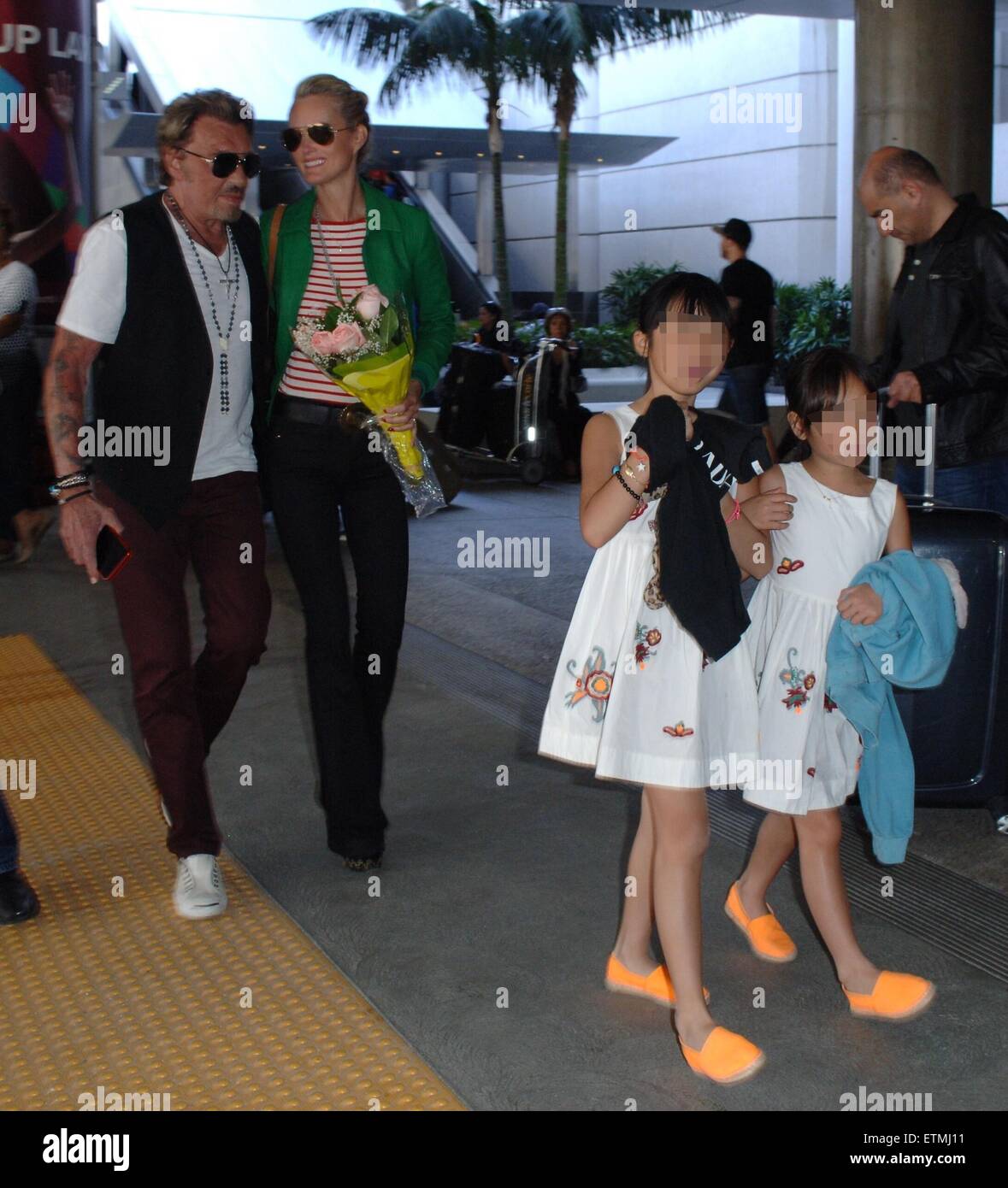 Johnny Hallyday arrive à Los Angeles International (LAX) aéroport avec ...