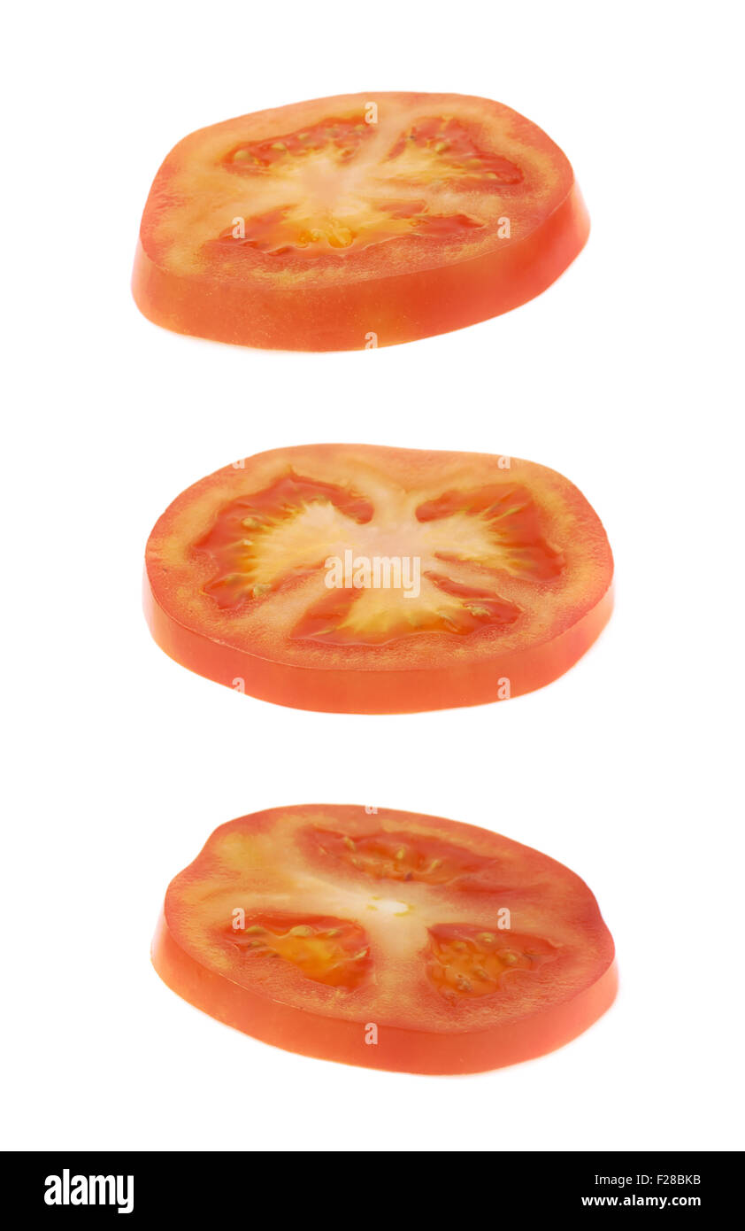 Section de tomate isolés coupe Photo Stock - Alamy