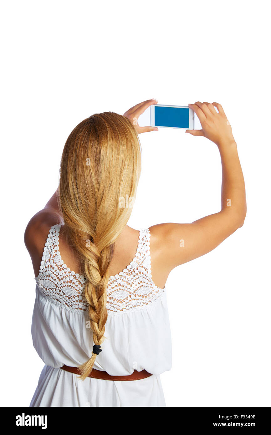 Blonde girl touristique prendre des photos avec le smartphone sur fond ...