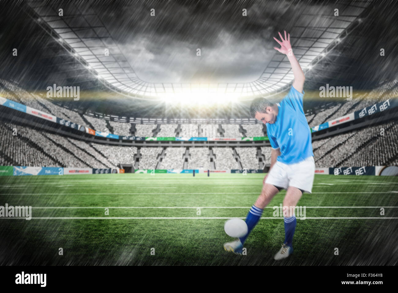 Joueur qui frappe un ballon de rugby Banque de photographies et d ...