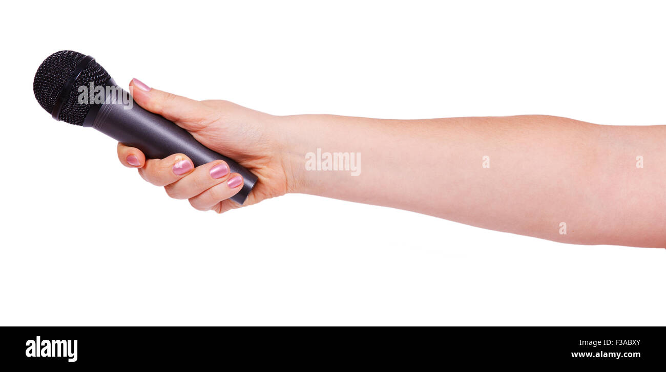 Une main noire qui tient un micro Banque de photographies et d’images à ...