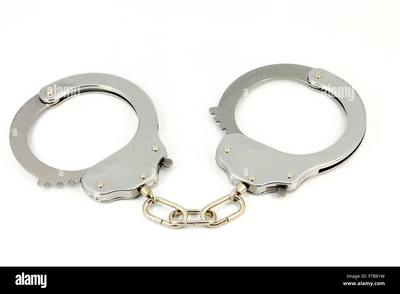 Menottes aux mains Banque de photographies et d’images à haute ...