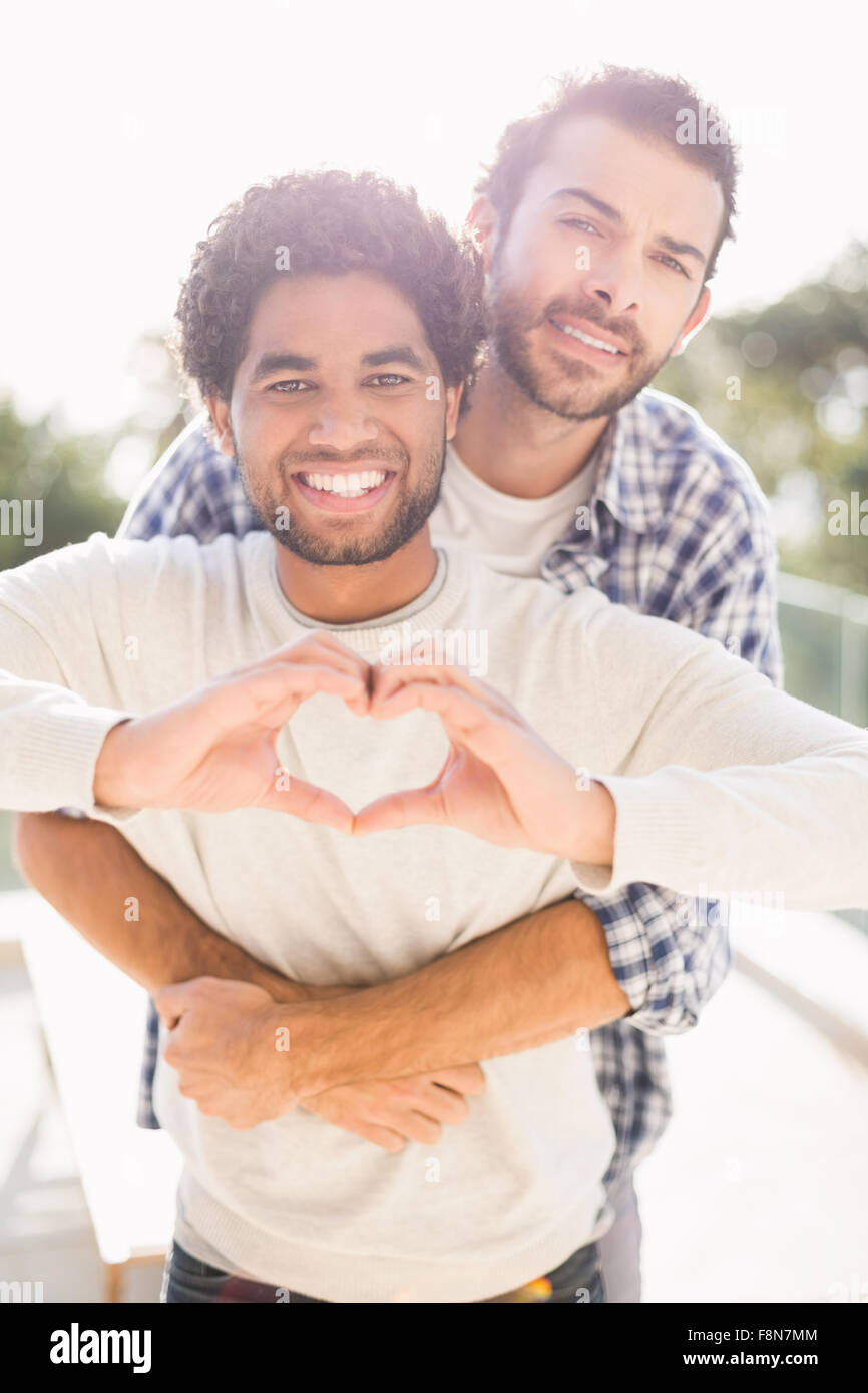 Happy Gay Couple Hugging Outdoors Banque De Photographies Et Dimages à