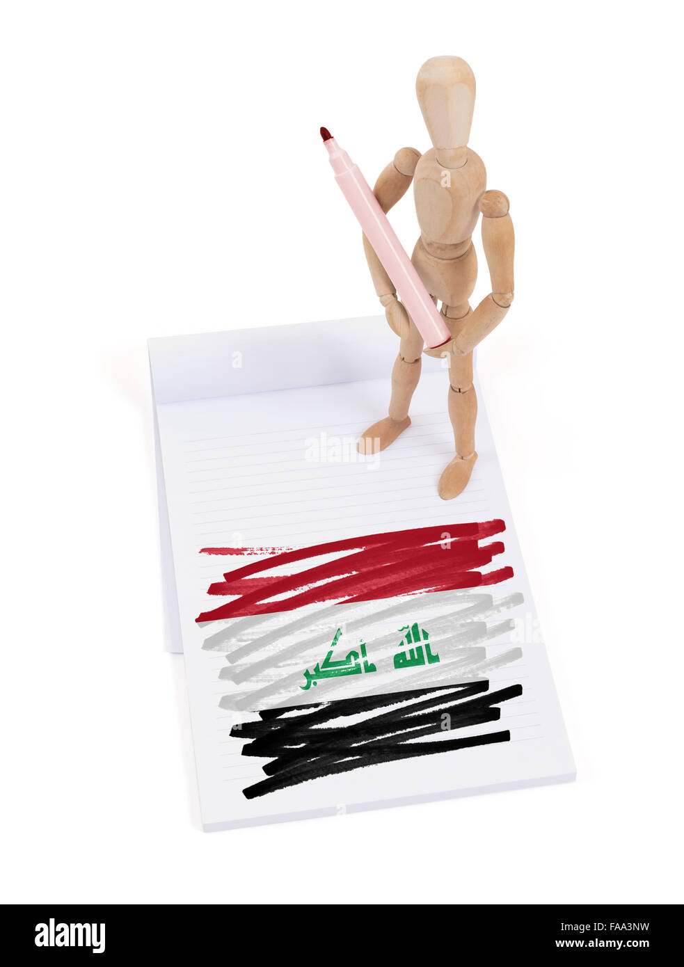 Mannequin en bois fait un dessin d'un drapeau - Iraq Photo Stock - Alamy