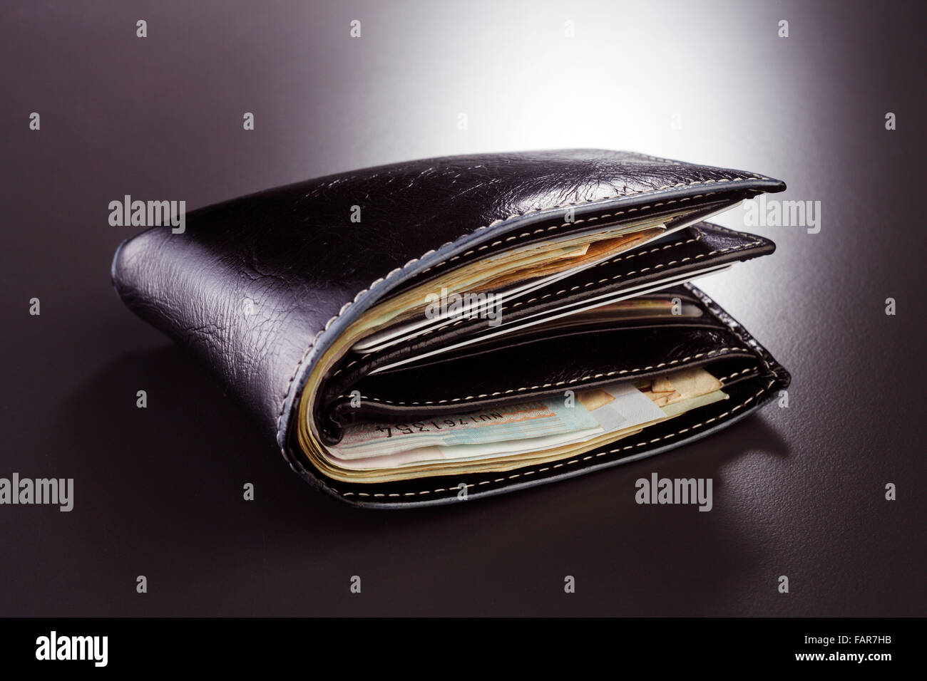 Porte monnaie plein Banque de photographies et d’images à haute ...