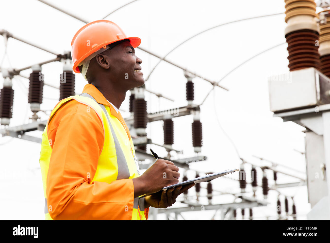 Happy electrical engineer in substation Banque de photographies et d ...